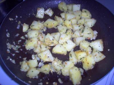 A Tasty Trini Herbed Potatoes