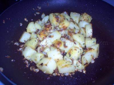 A Tasty Trini Herbed Potatoes